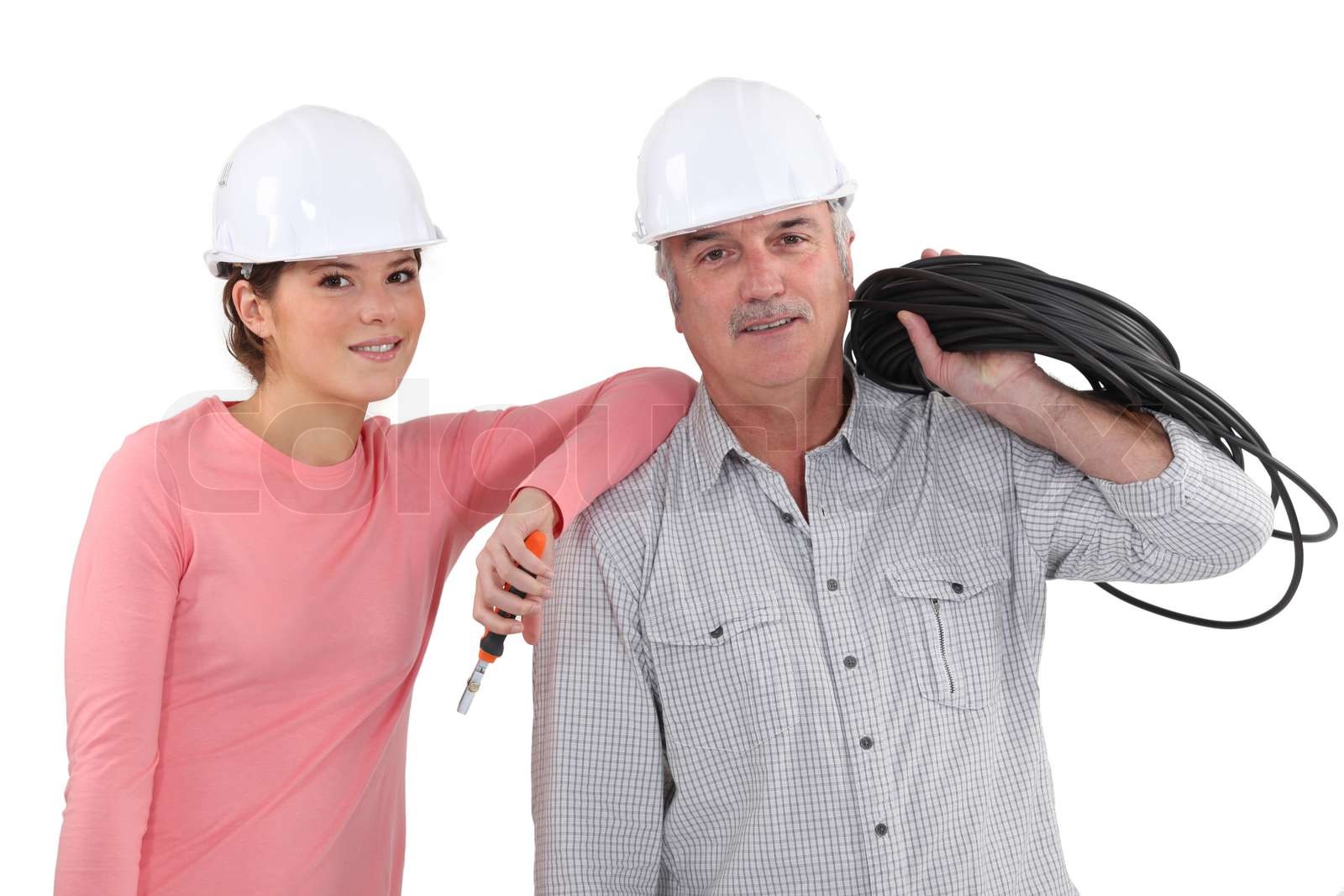 Father and daughter with electrical cable | Stock image | Colourbox