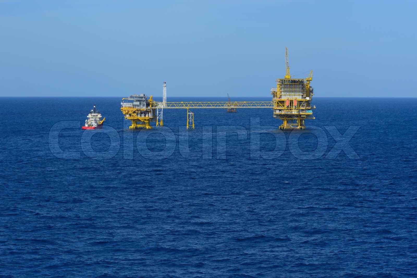 The offshore oil rig and supply boat | Stock image | Colourbox