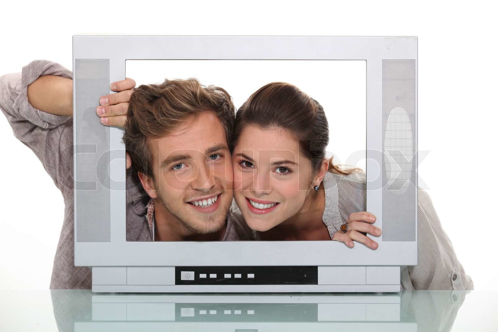 Couple inside a tv screen | Stock image | Colourbox