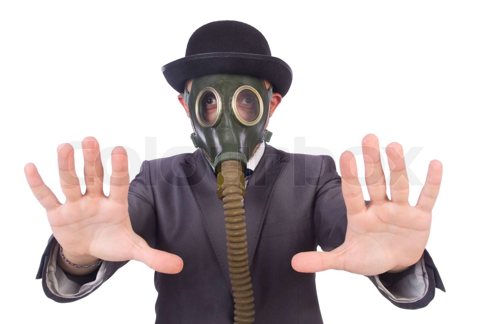 Geschäftsmann trägt Gasmaske isoliert auf weiß | Stock Bild | Colourbox