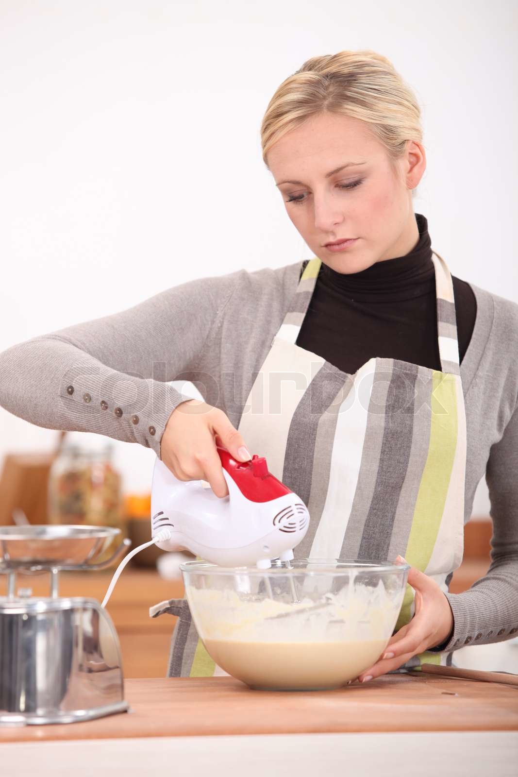 Woman whisking batter | Stock image | Colourbox
