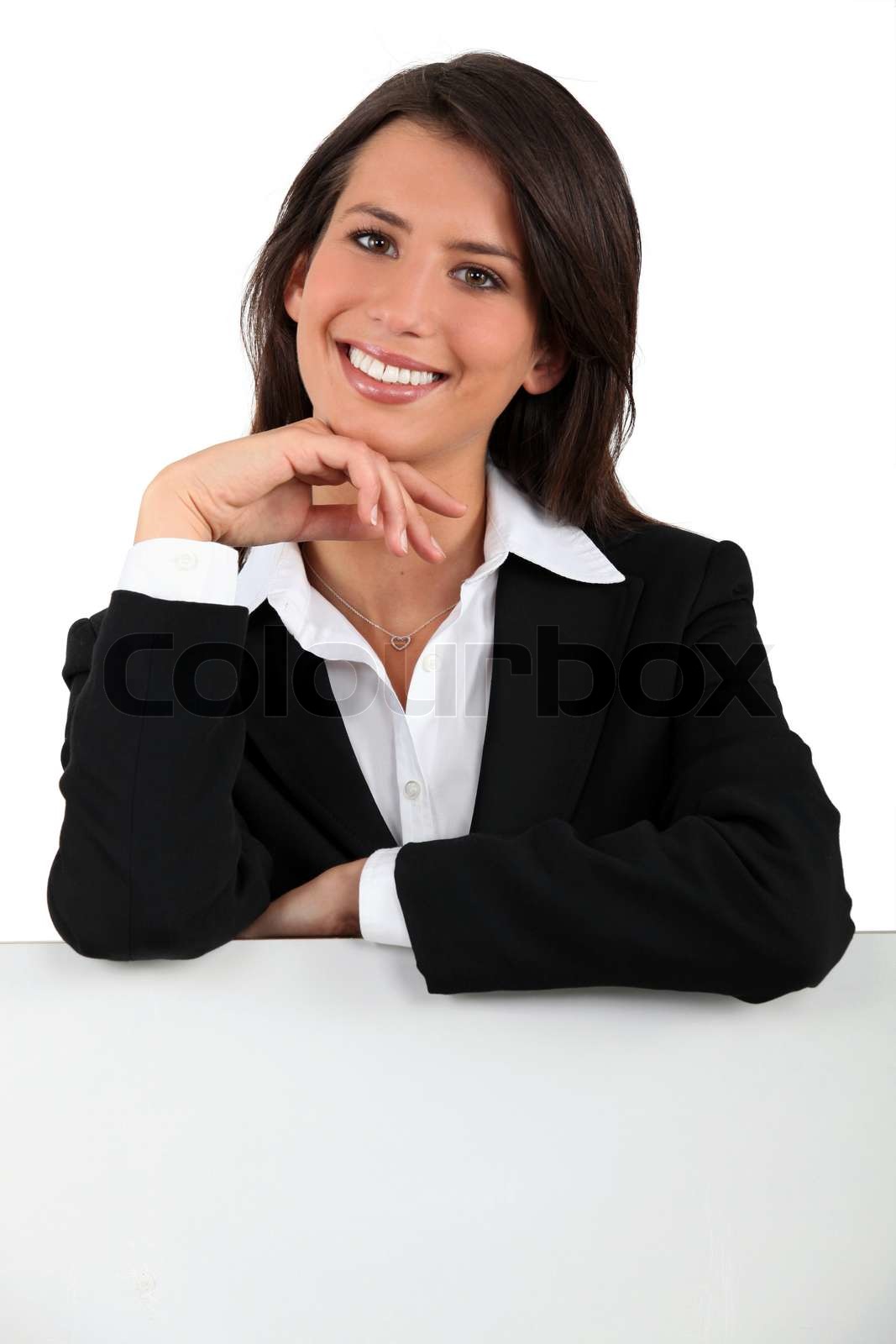 Woman with chin on hand | Stock image | Colourbox
