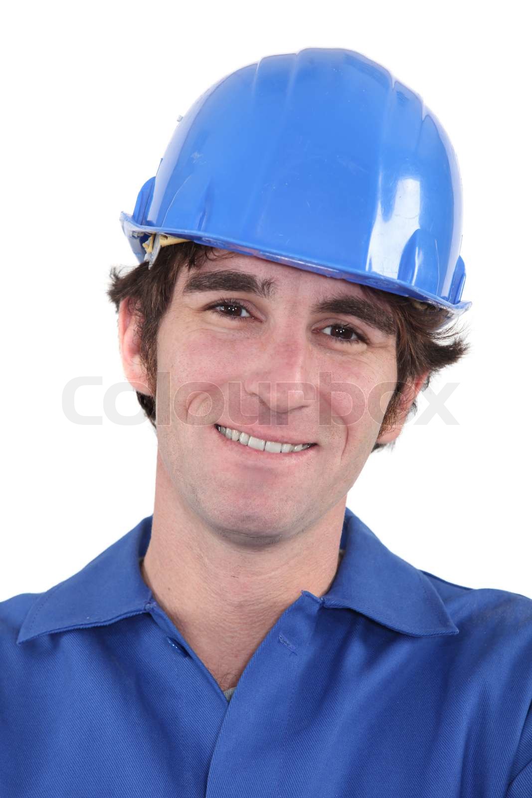 Architect wearing hard hat | Stock image | Colourbox