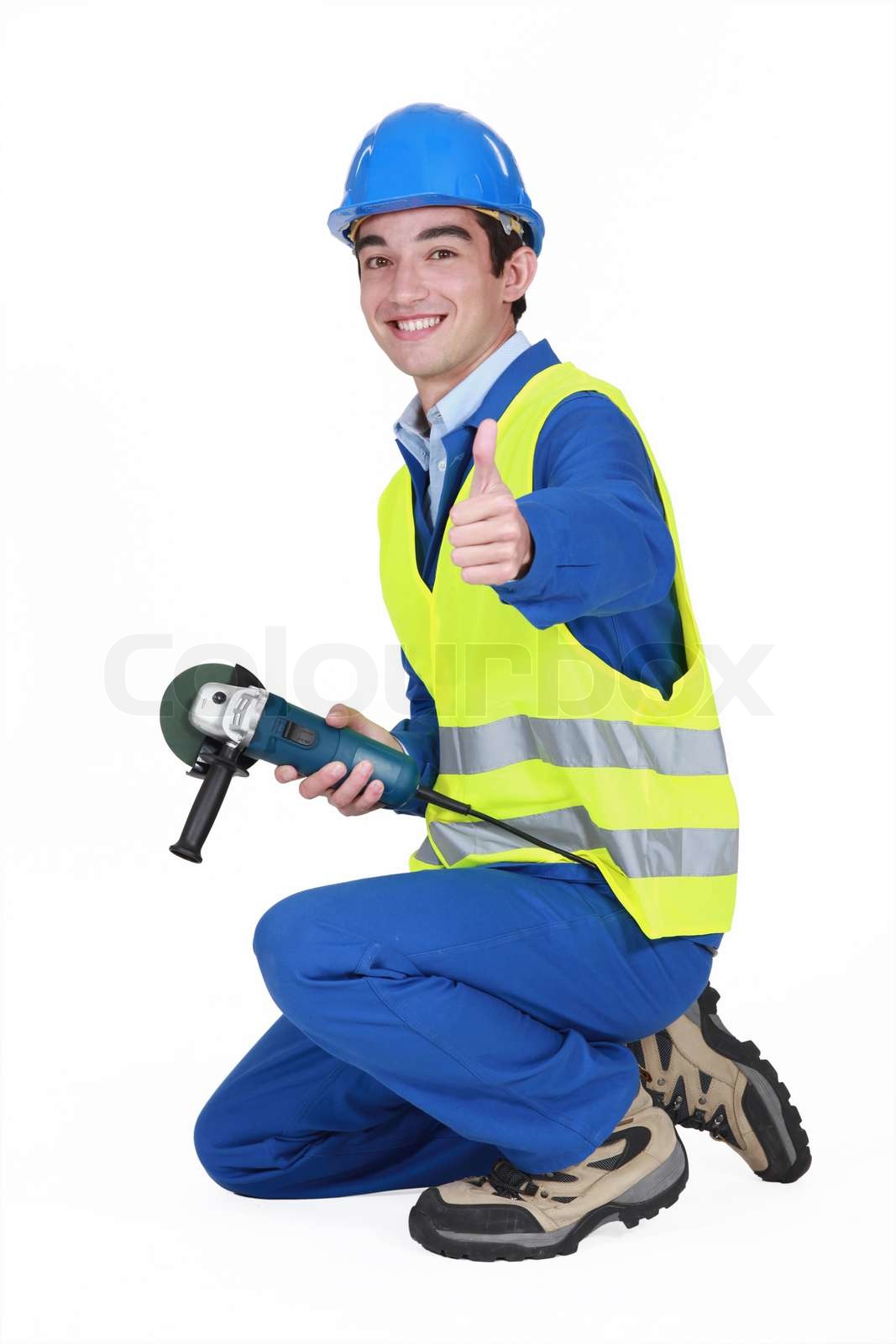 Happy workman, studio shot | Stock image | Colourbox