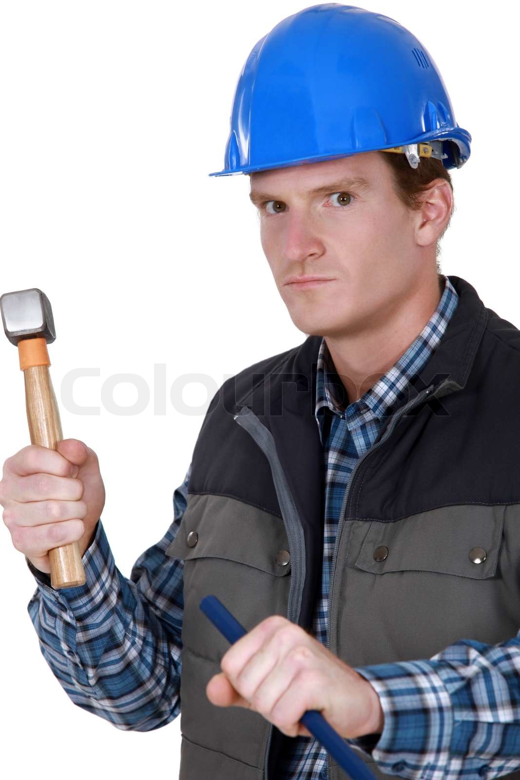 Wütend Erbauer mit Hammer und Meißel | Stock Bild | Colourbox