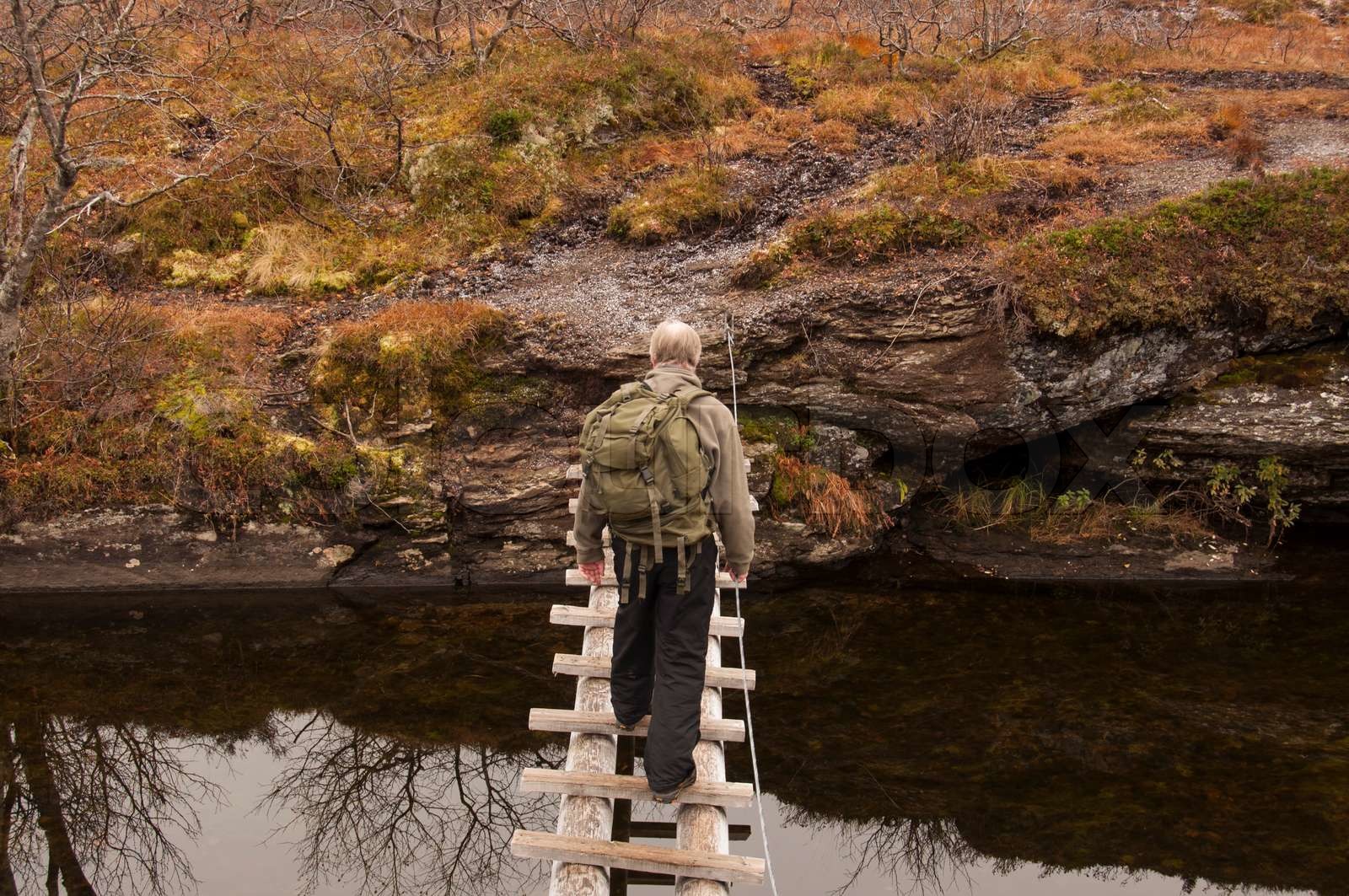 Man on bridge | Stock image | Colourbox