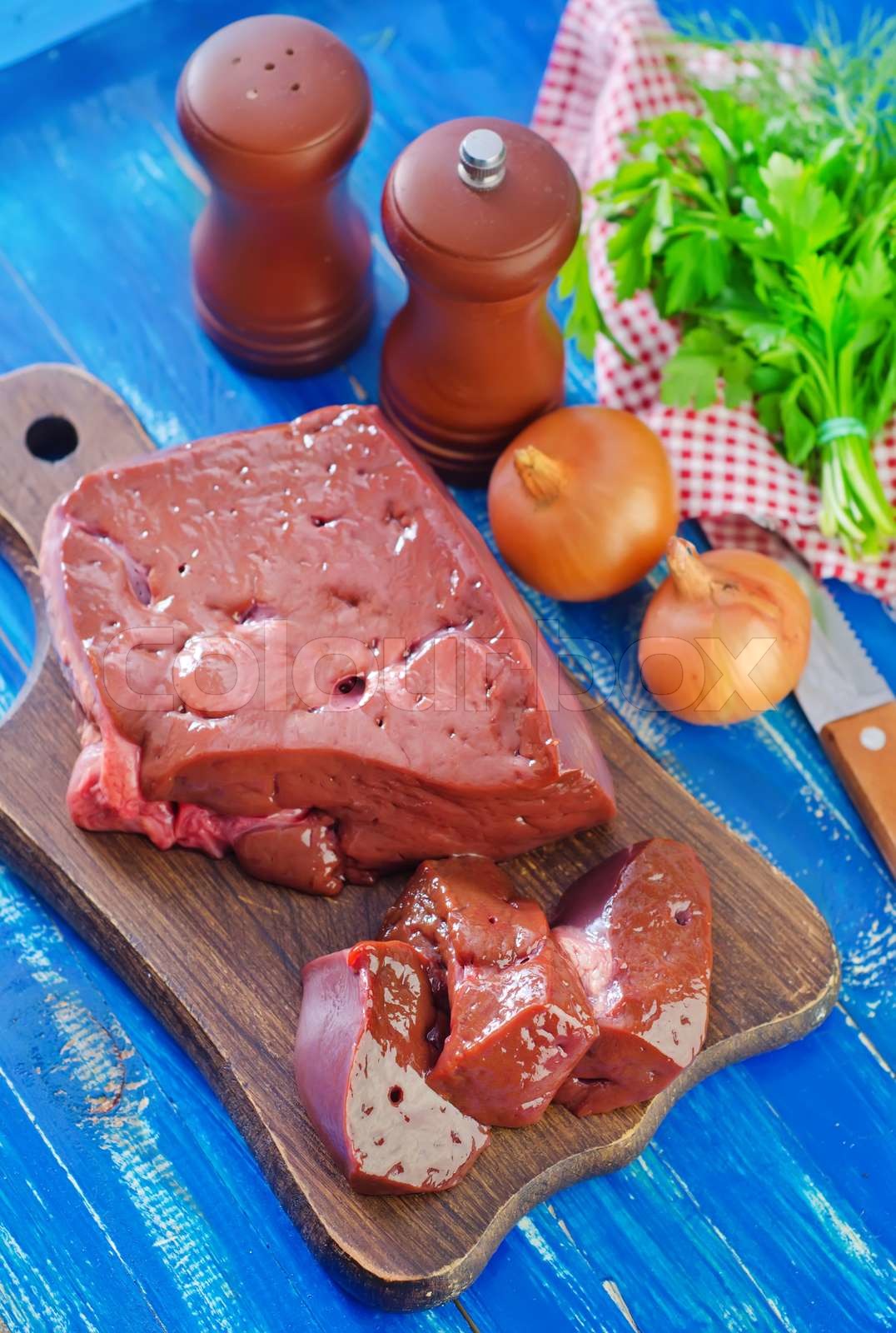 raw liver on board | Stock image | Colourbox