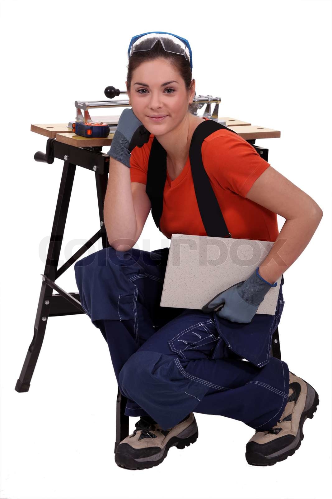 Female tile cutter | Stock image | Colourbox