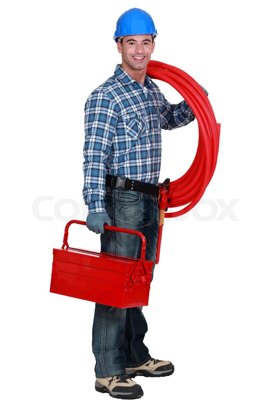 Plumber holding tool-box and plastic pipe | Stock image | Colourbox