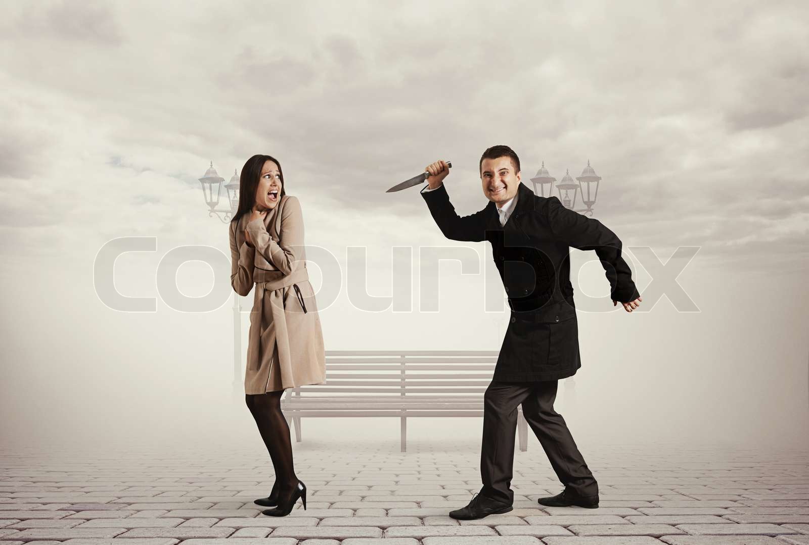 funny maniac attacking woman | Stock image | Colourbox