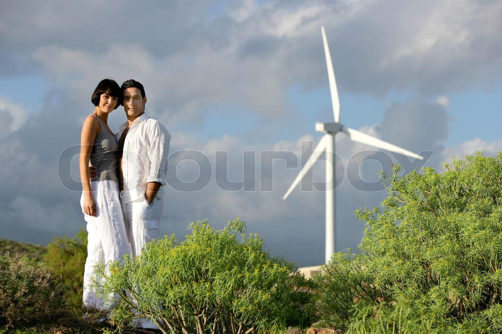 Couple stood on wind farm | Stock image | Colourbox