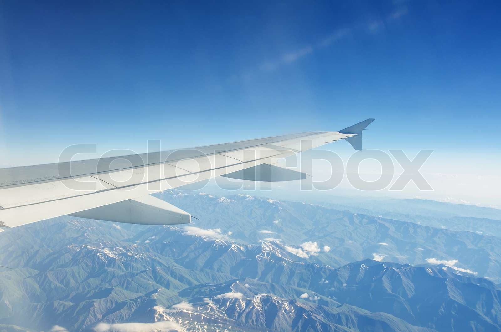 Airplane wing out of window | Stock image | Colourbox