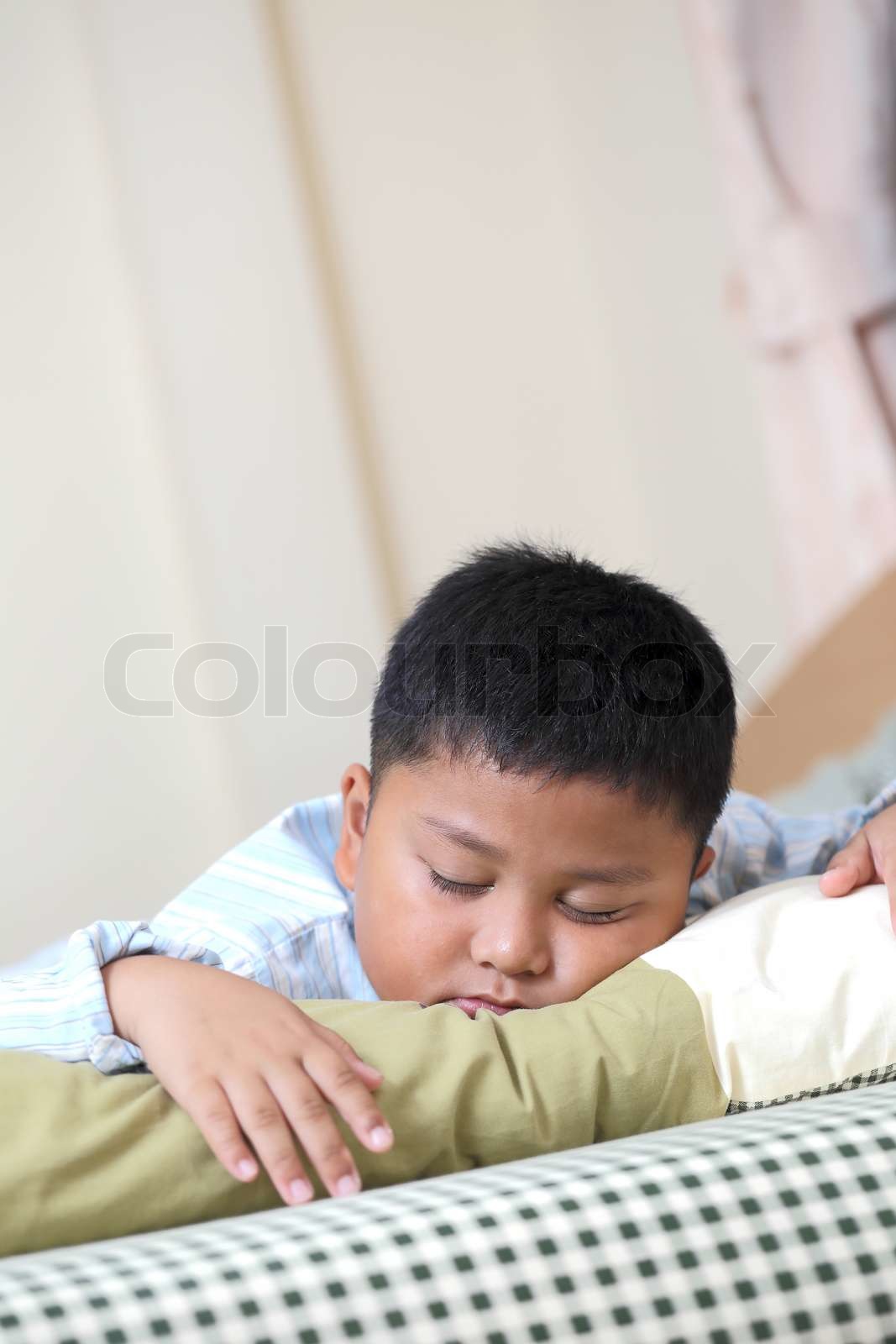 Asian children are sleeping | Stock image | Colourbox