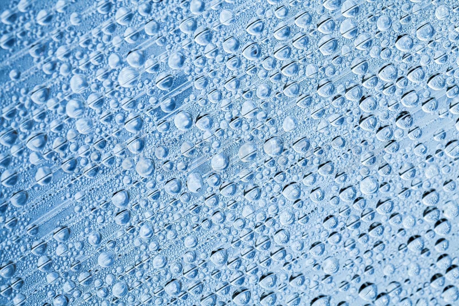 Wassertropfen auf transparente Kunststoff- Oberfläche Photo Hintergrund ...