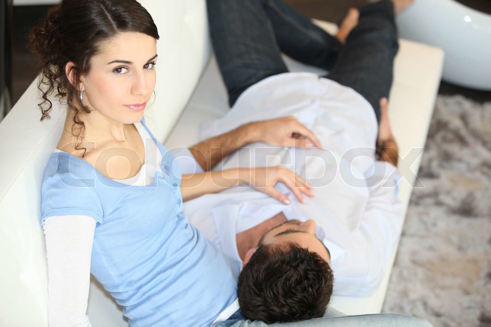 Man laying on girlfriend | Stock image | Colourbox