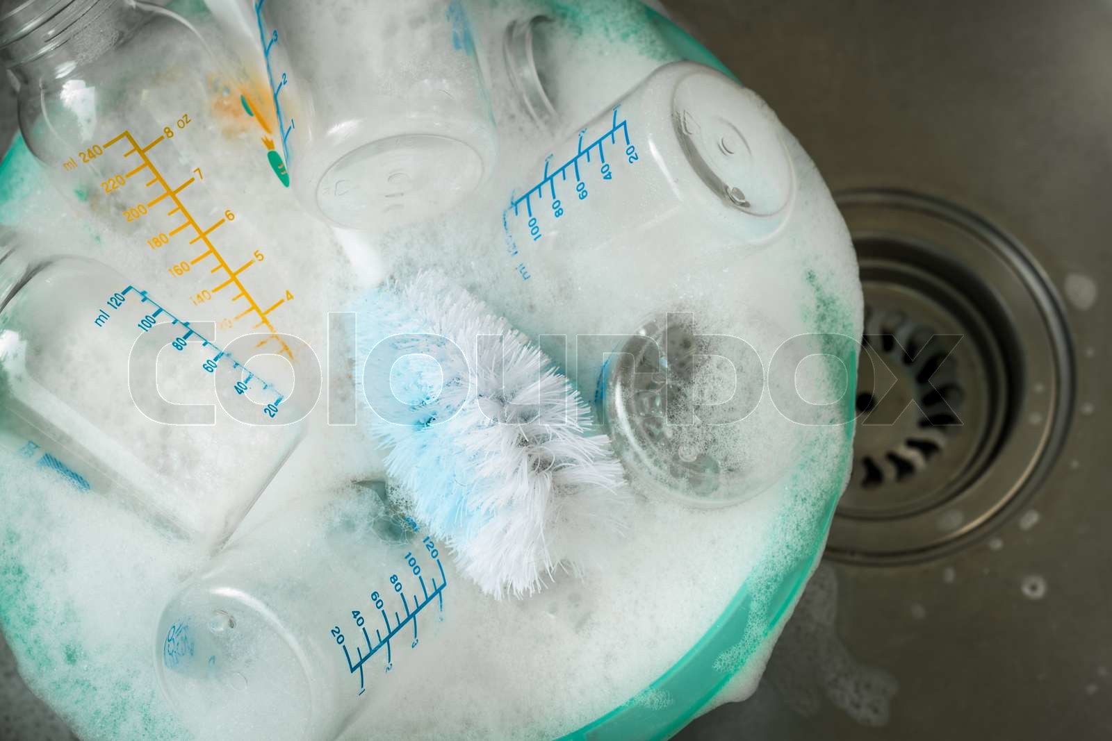 bottle of milk are washing | Stock image | Colourbox