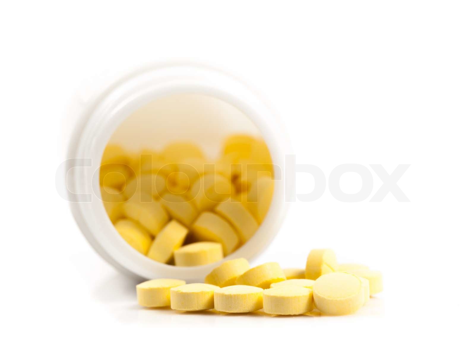 Yellow pills | Stock image | Colourbox