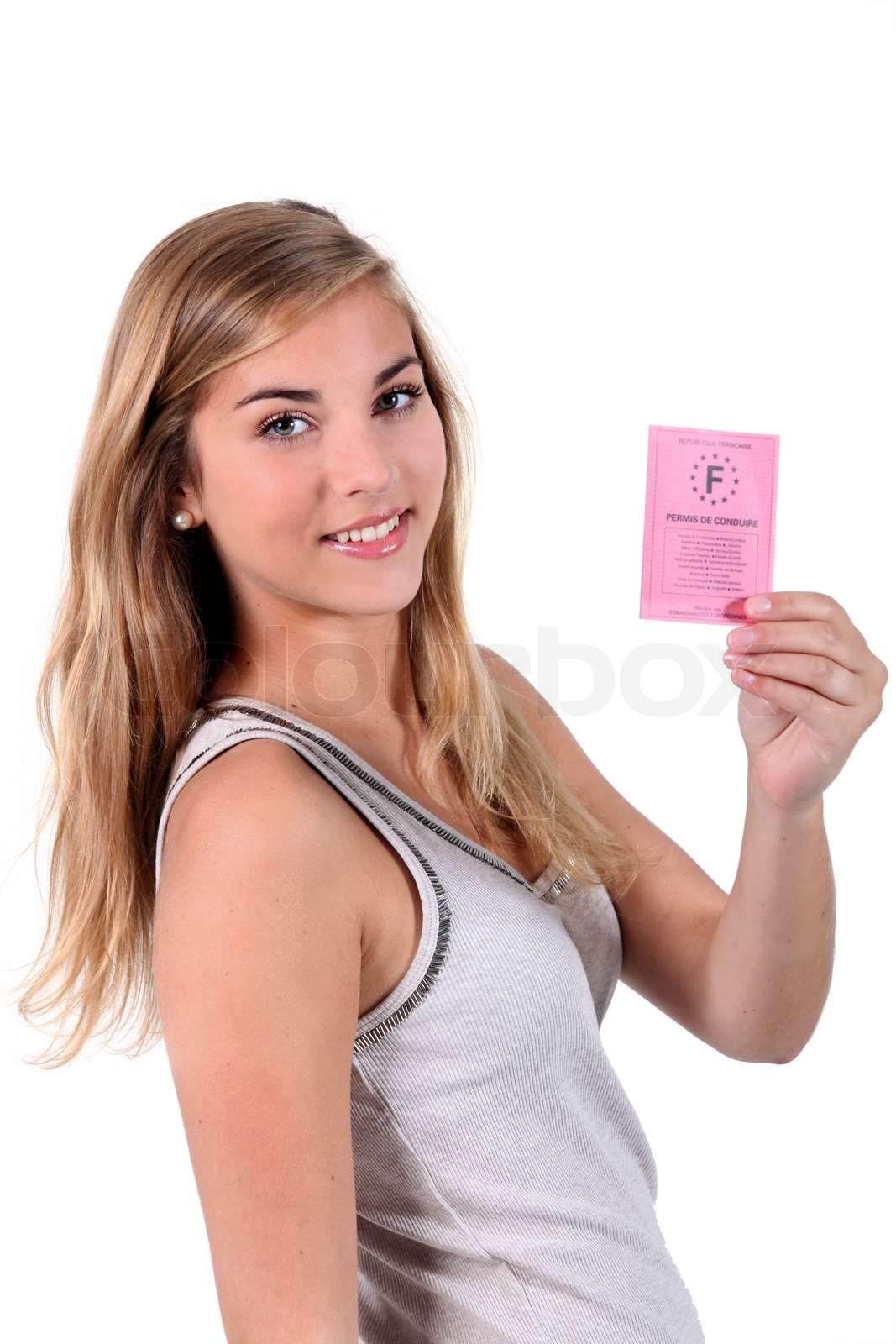 Girl with a driving license | Stock image | Colourbox