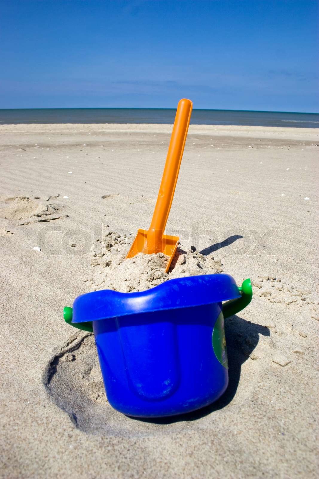 Beach spade and bucket | Stock image | Colourbox