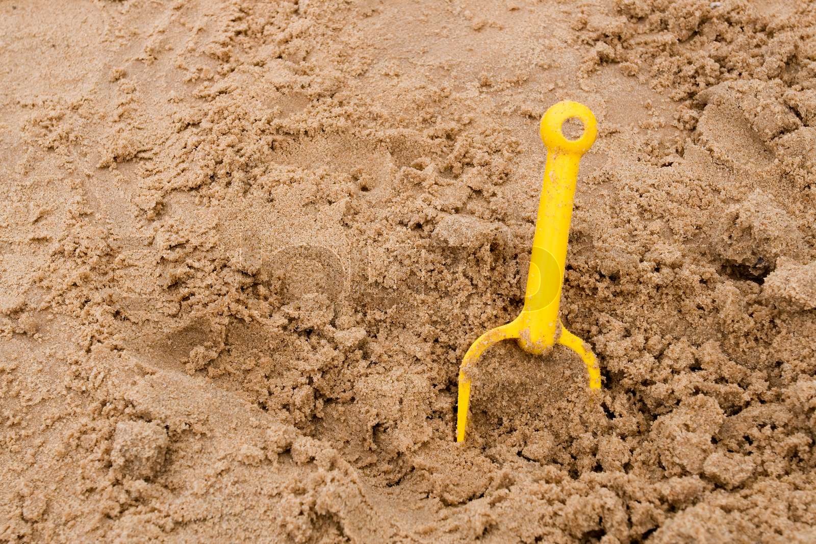 yellow sand spade | Stock image | Colourbox