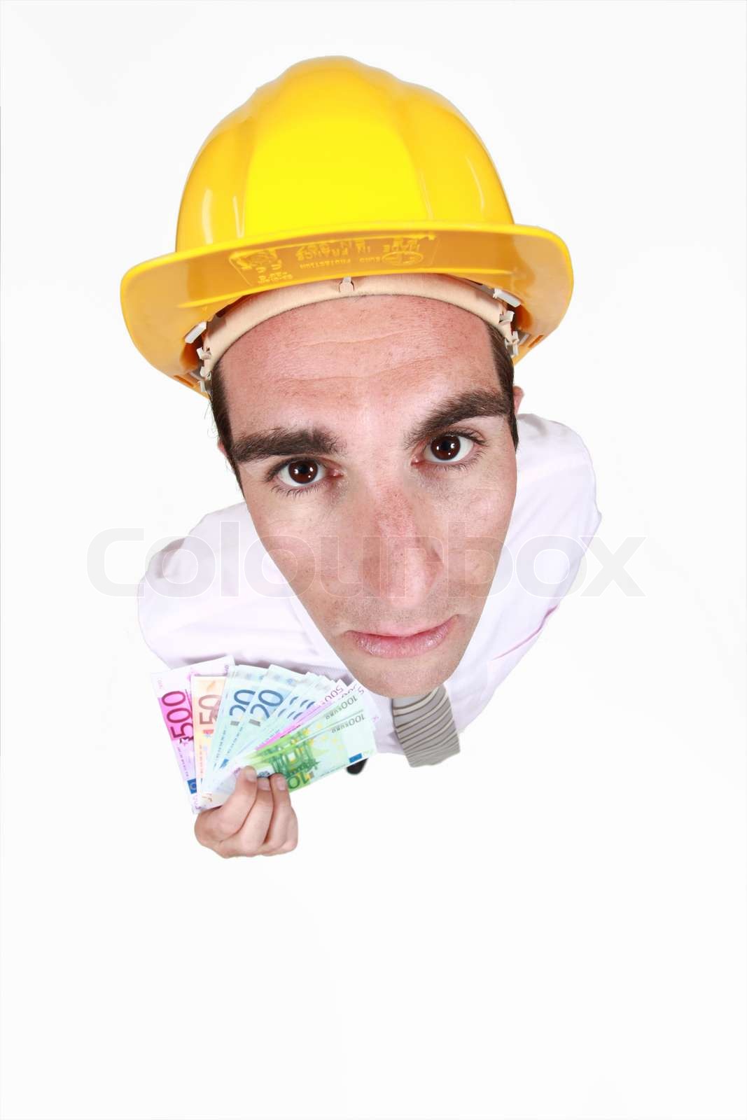 Mann mit Helm und Karten in der hand | Stock Bild | Colourbox