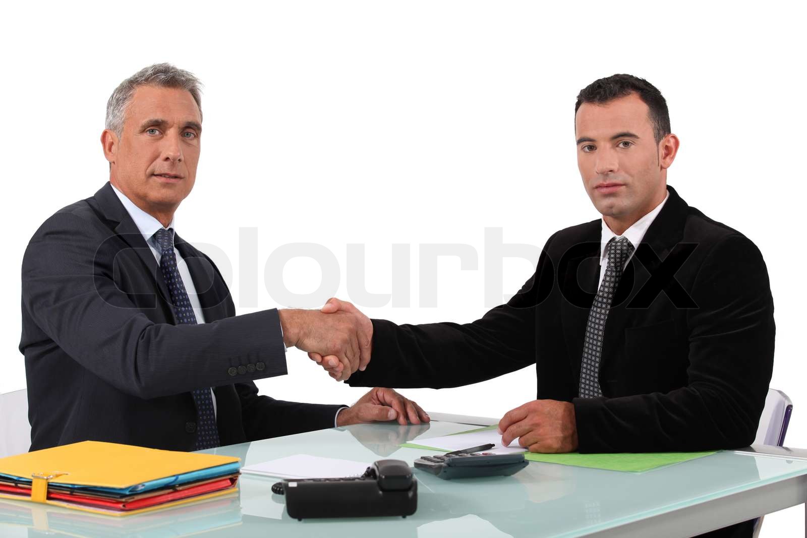 Boss welcoming new colleague | Stock image | Colourbox