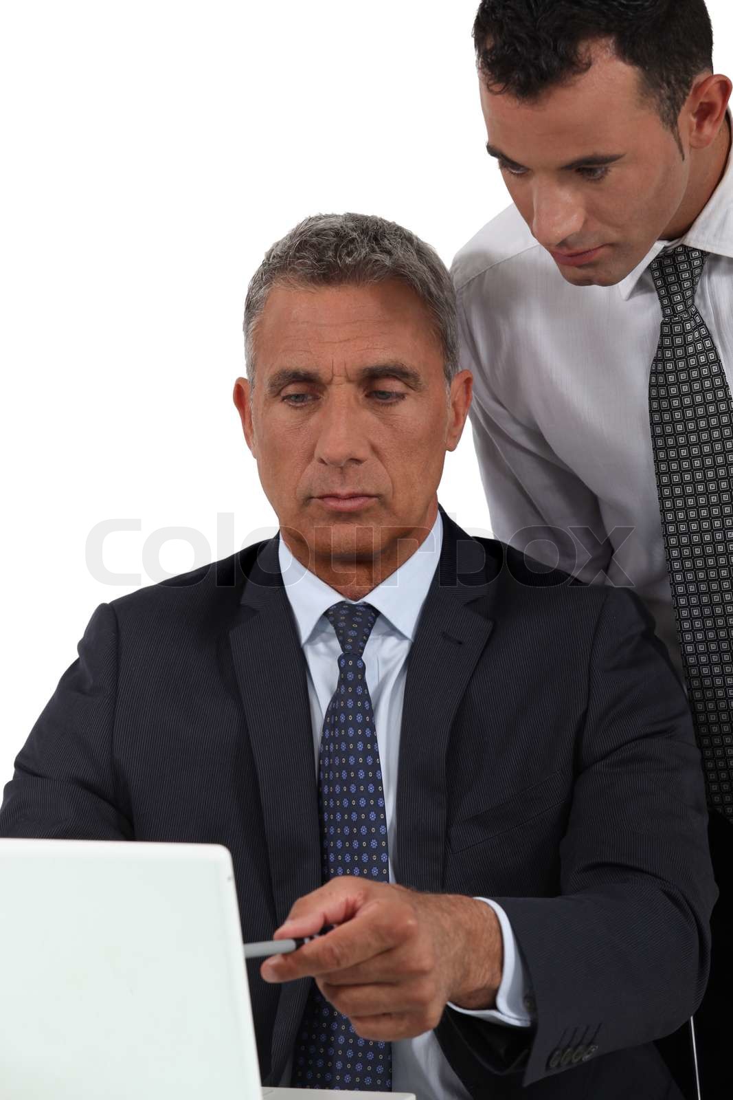 Boss explaining something to employee | Stock image | Colourbox