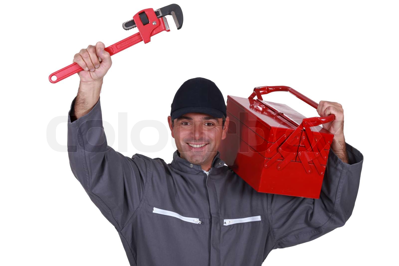 Man with a wrench and tool box | Stock image | Colourbox