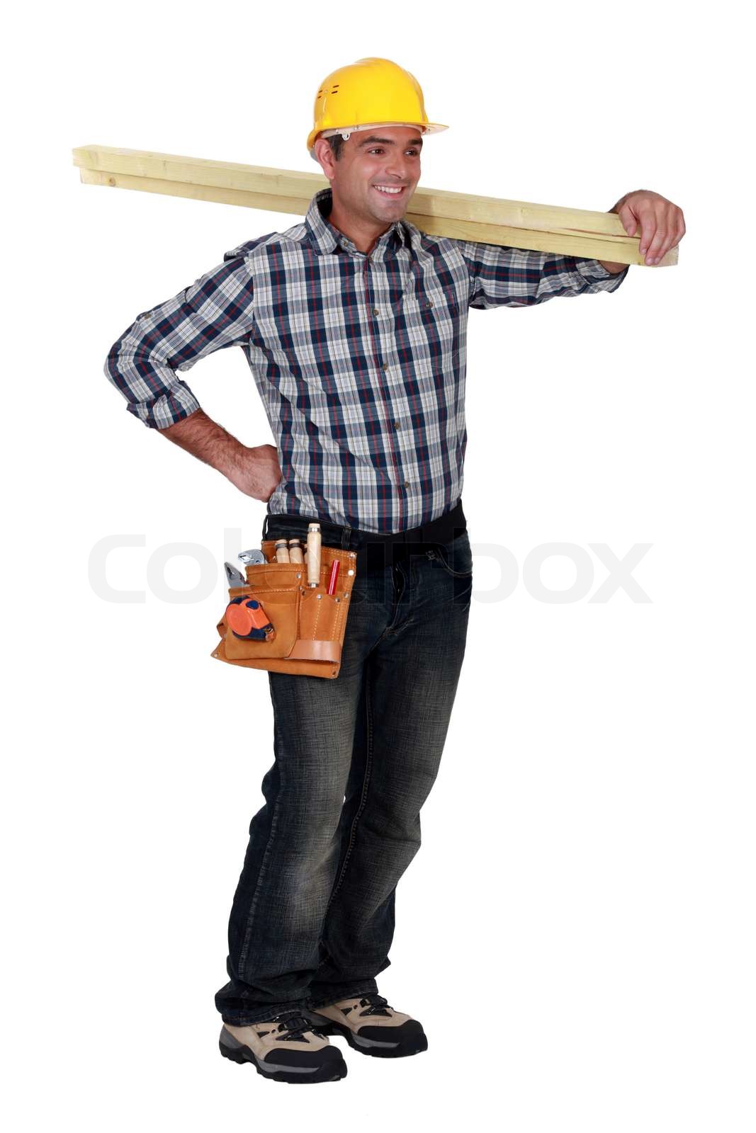 Glückliche Zimmermann steht auf weißem Hintergrund | Stock Bild | Colourbox