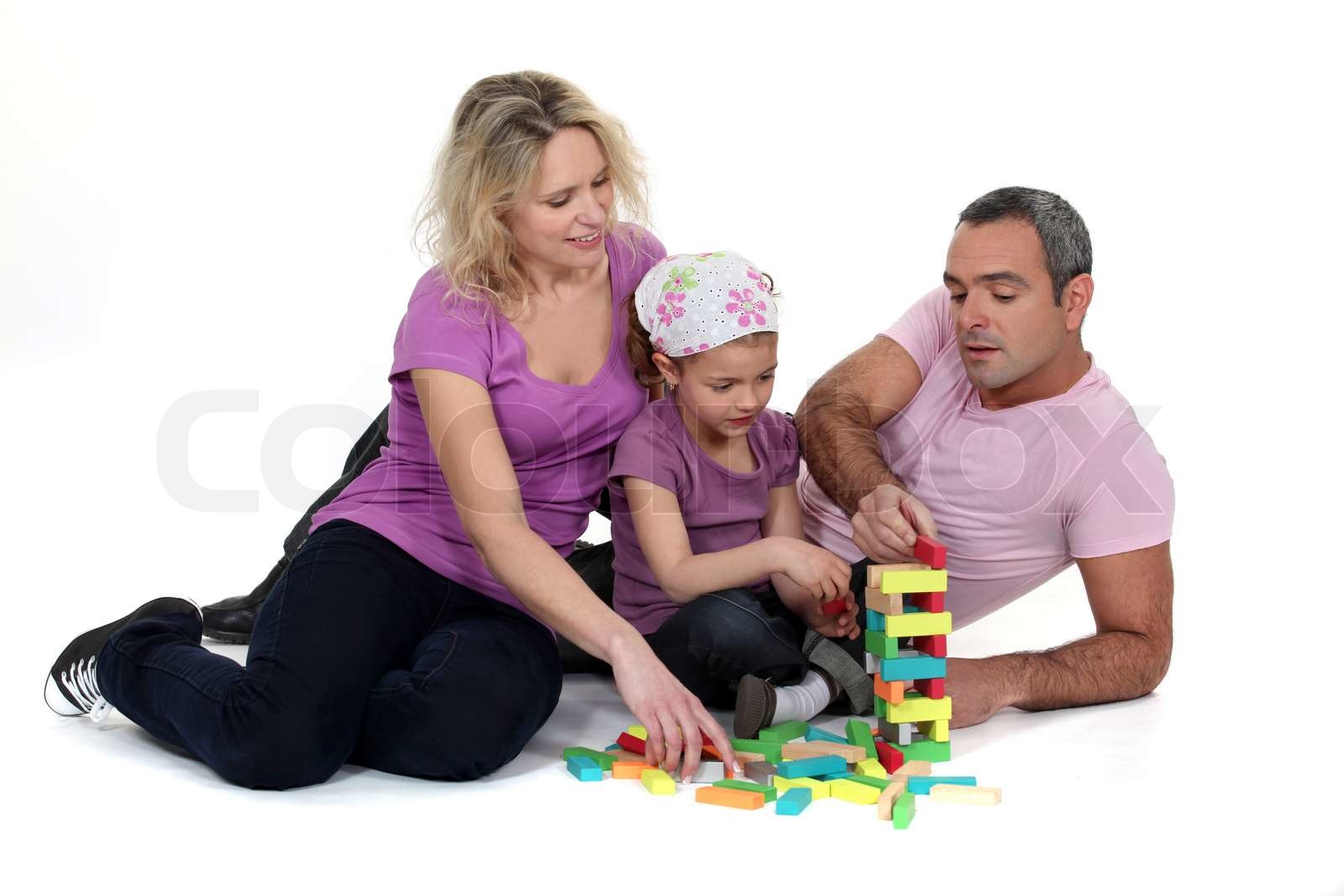 Family playing with building blocks | Stock image | Colourbox