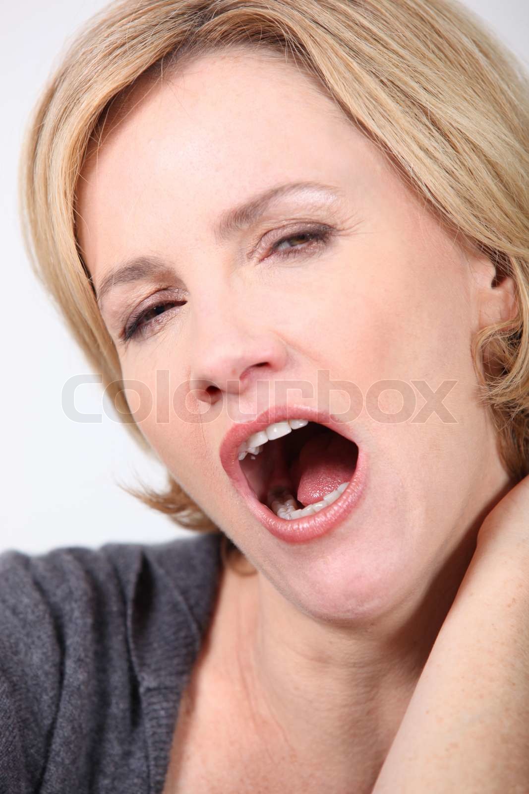 Woman yawning | Stock image | Colourbox