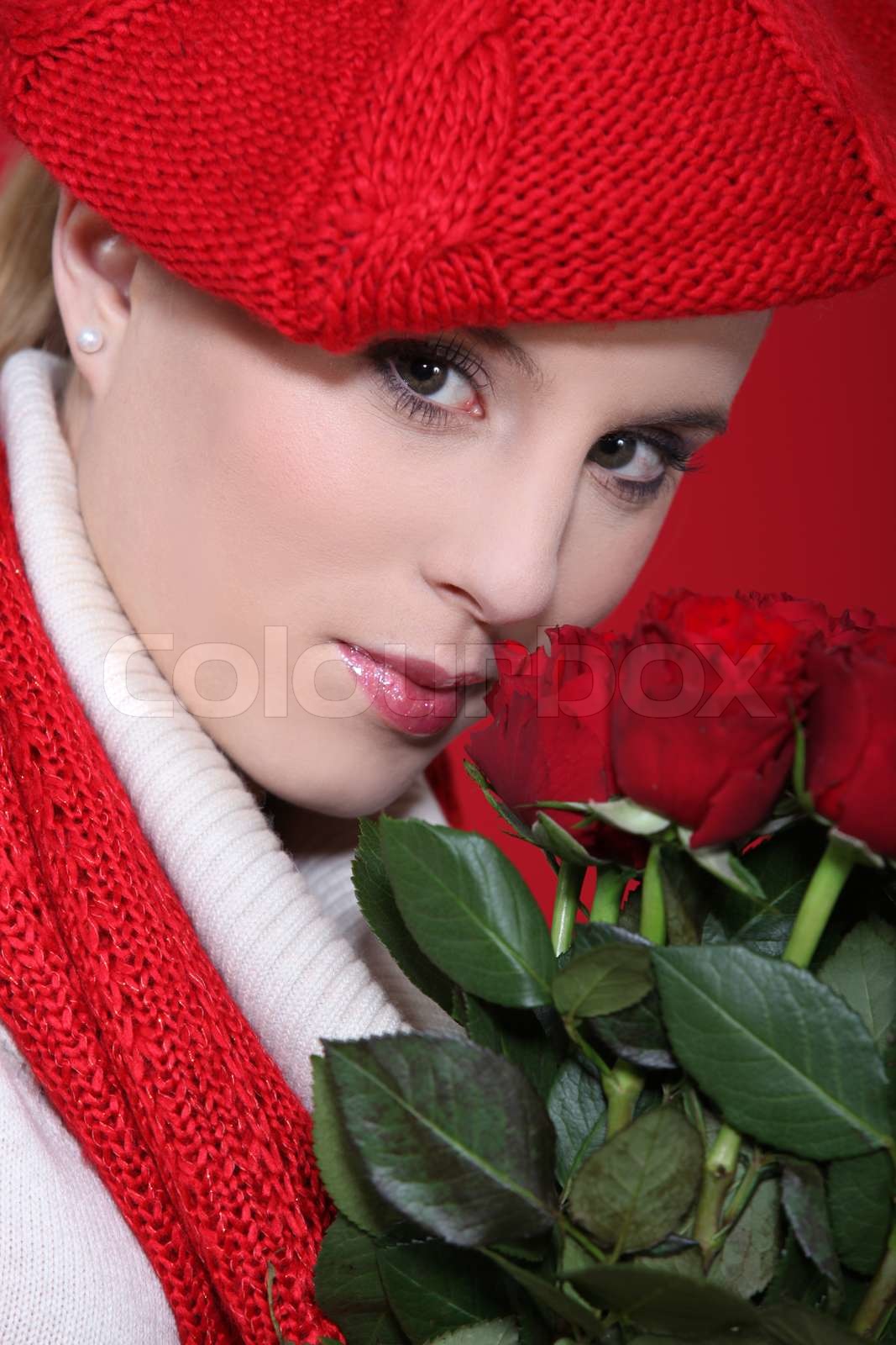 Woman with red roses | Stock image | Colourbox