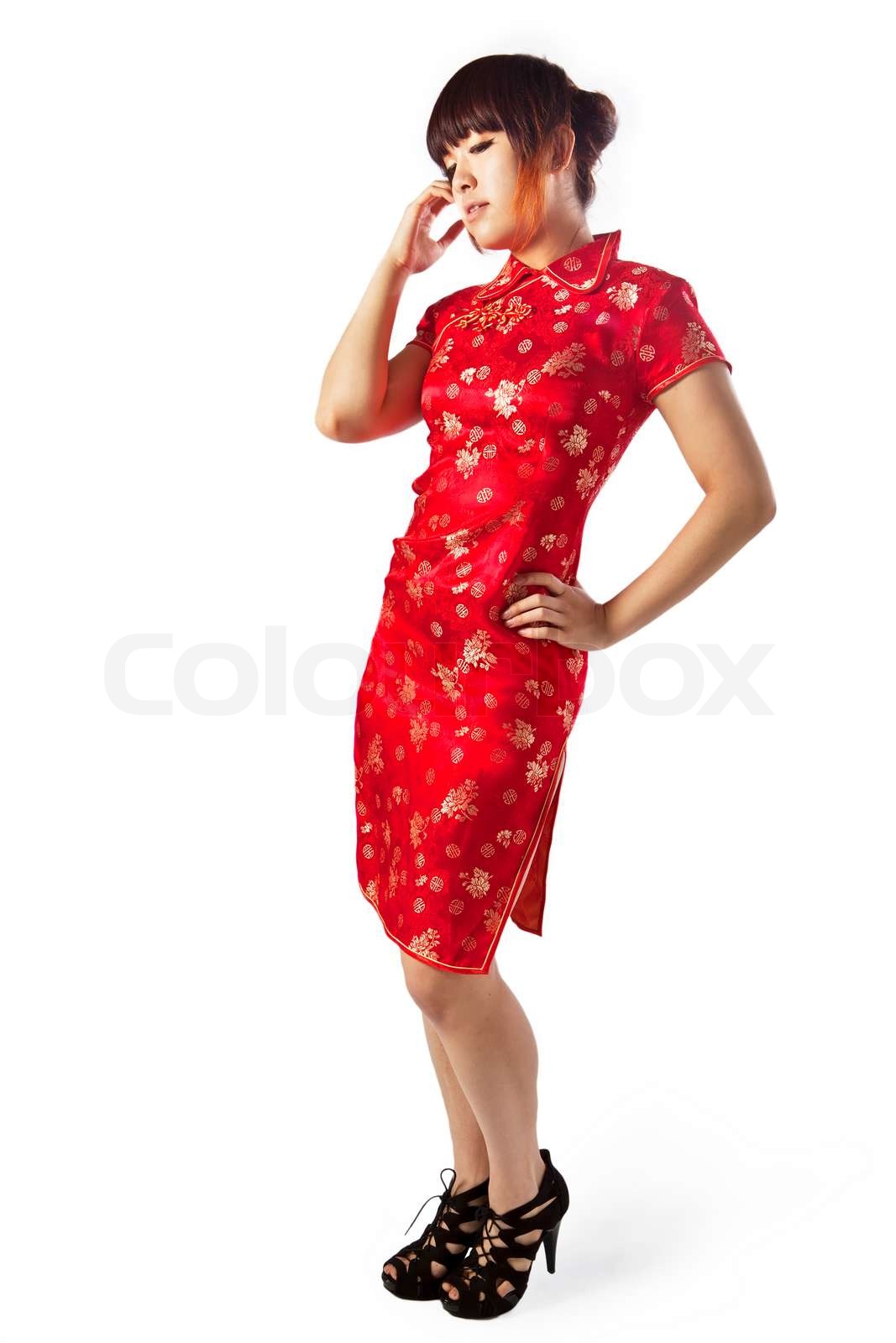 Chinese woman in Traditional Cheongsam | Stock image | Colourbox