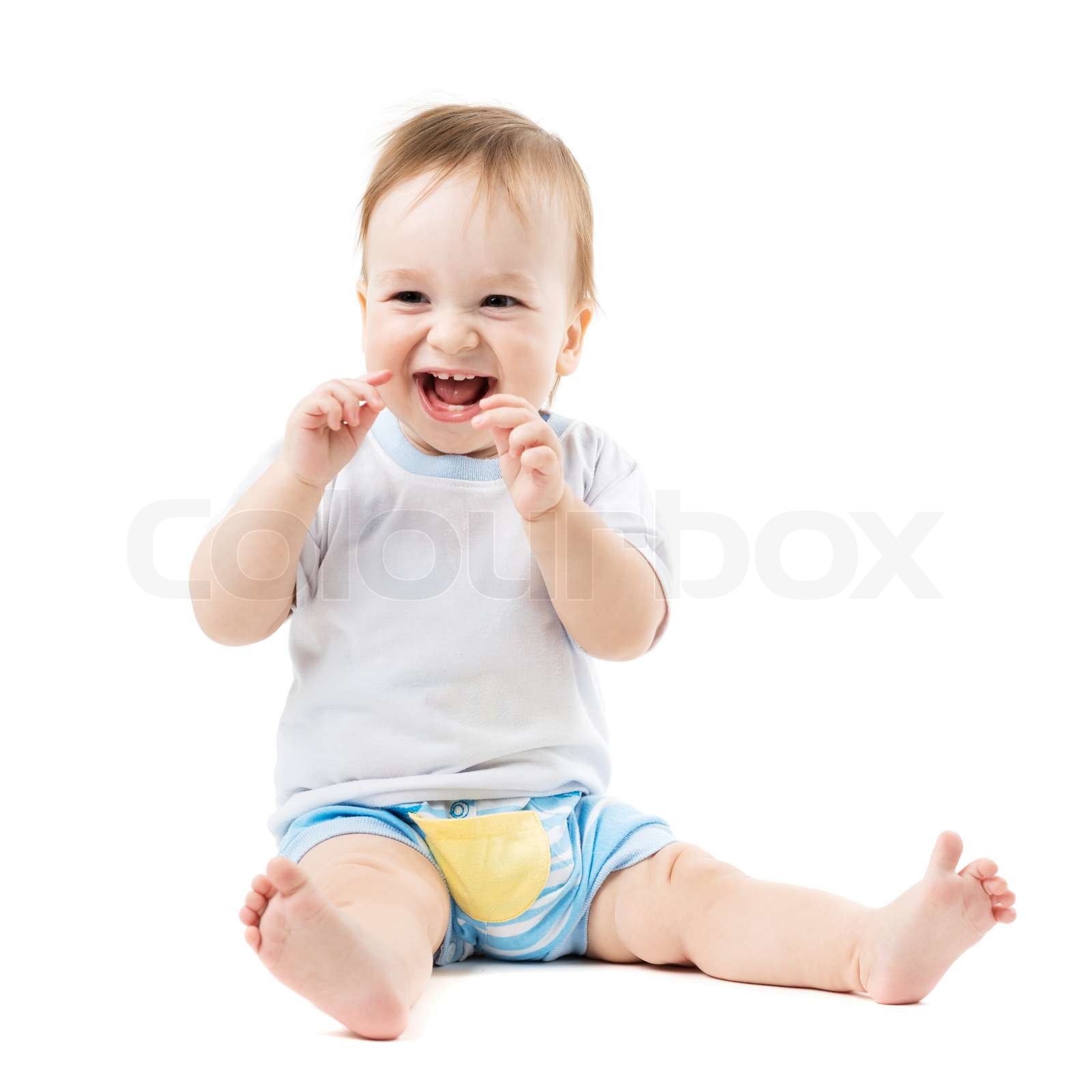 Baby sitzen und lachen | Stock Bild | Colourbox