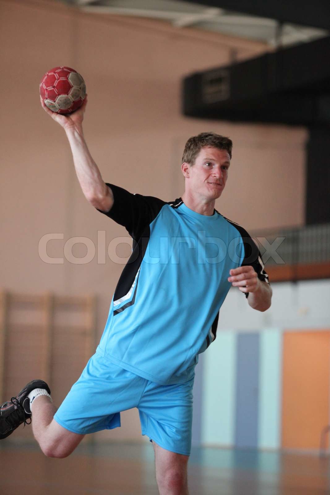 handball player is shooting | Stock image | Colourbox