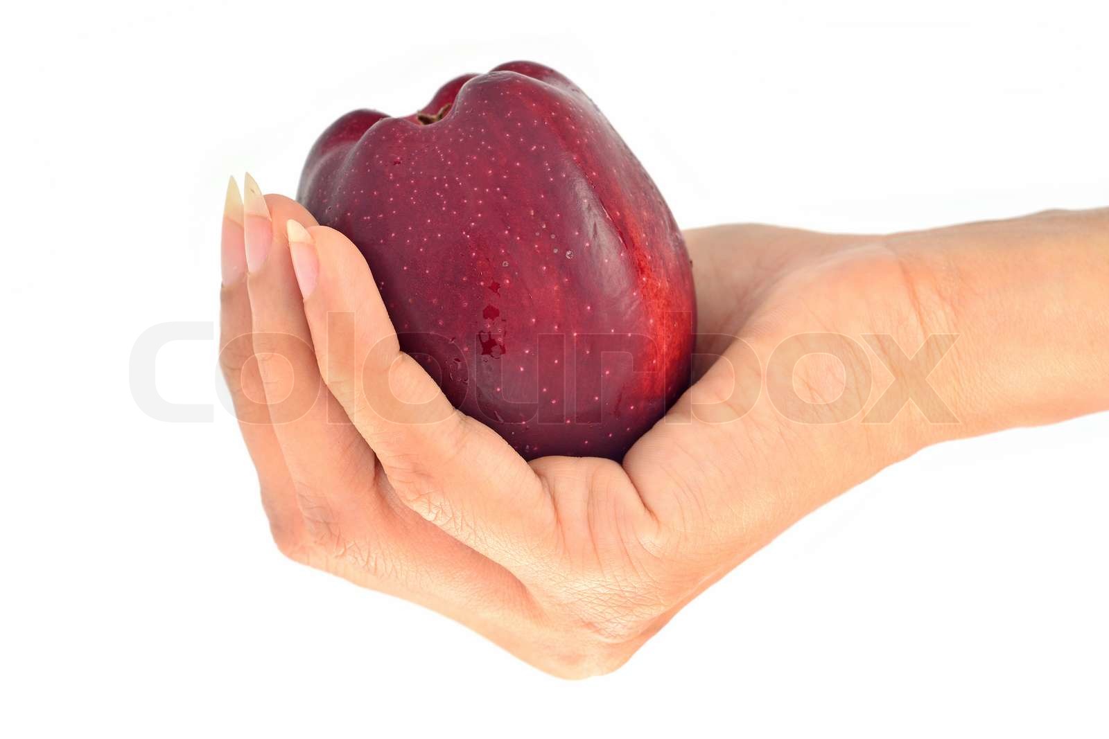 Apfel in der Hand | Stock Bild | Colourbox