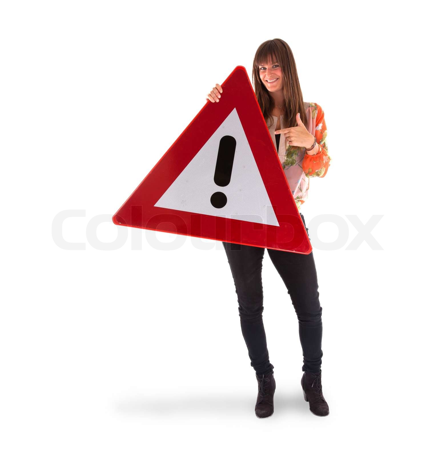 Concept of caution - Woman standing with caution sign | Stock image ...