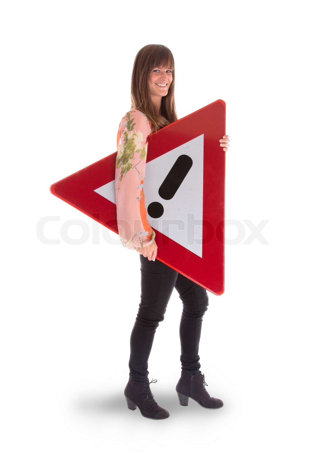 Concept of caution - Woman standing with caution sign | Stock image ...