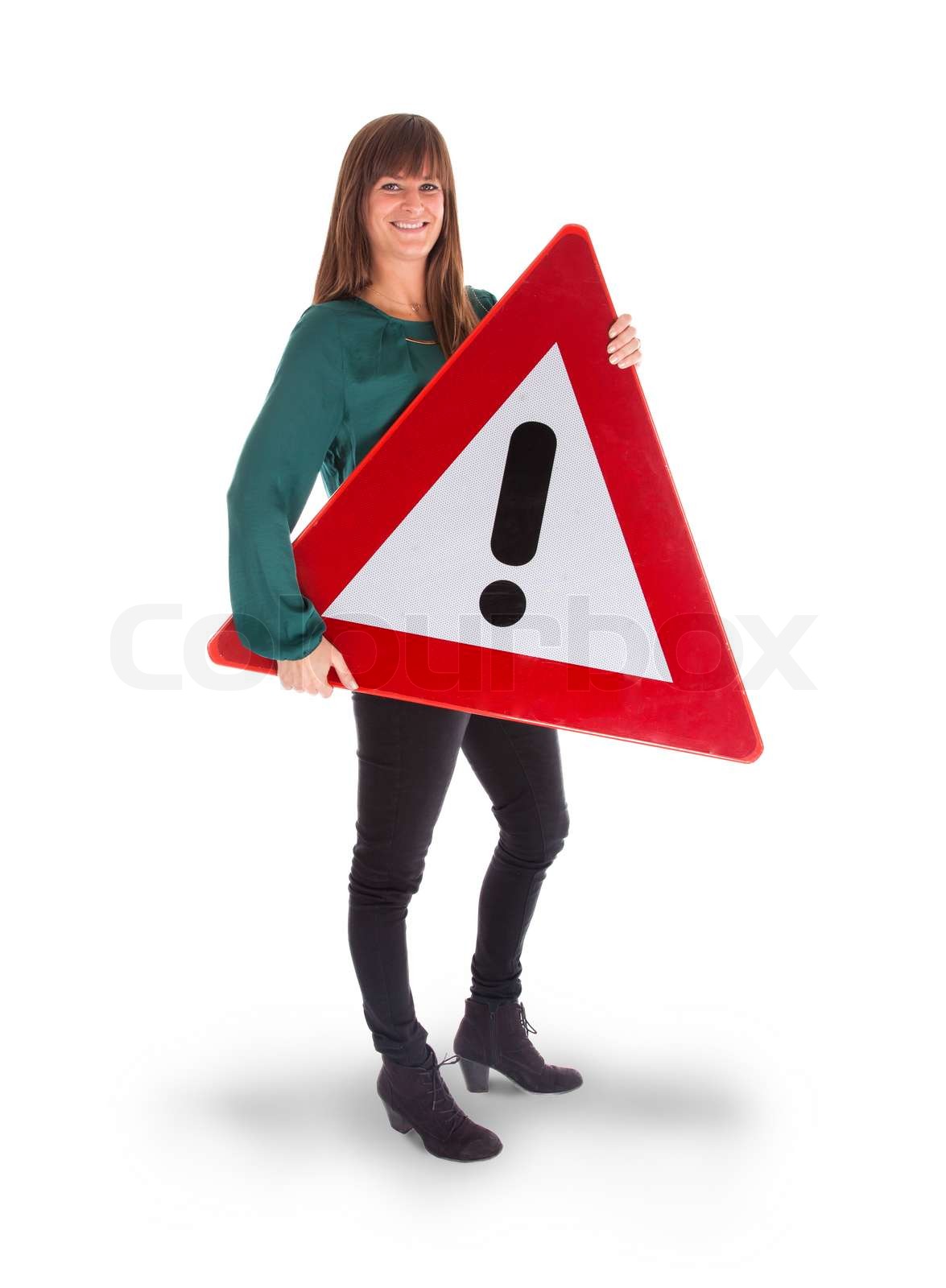 Concept of caution - Woman standing with caution sign | Stock image ...