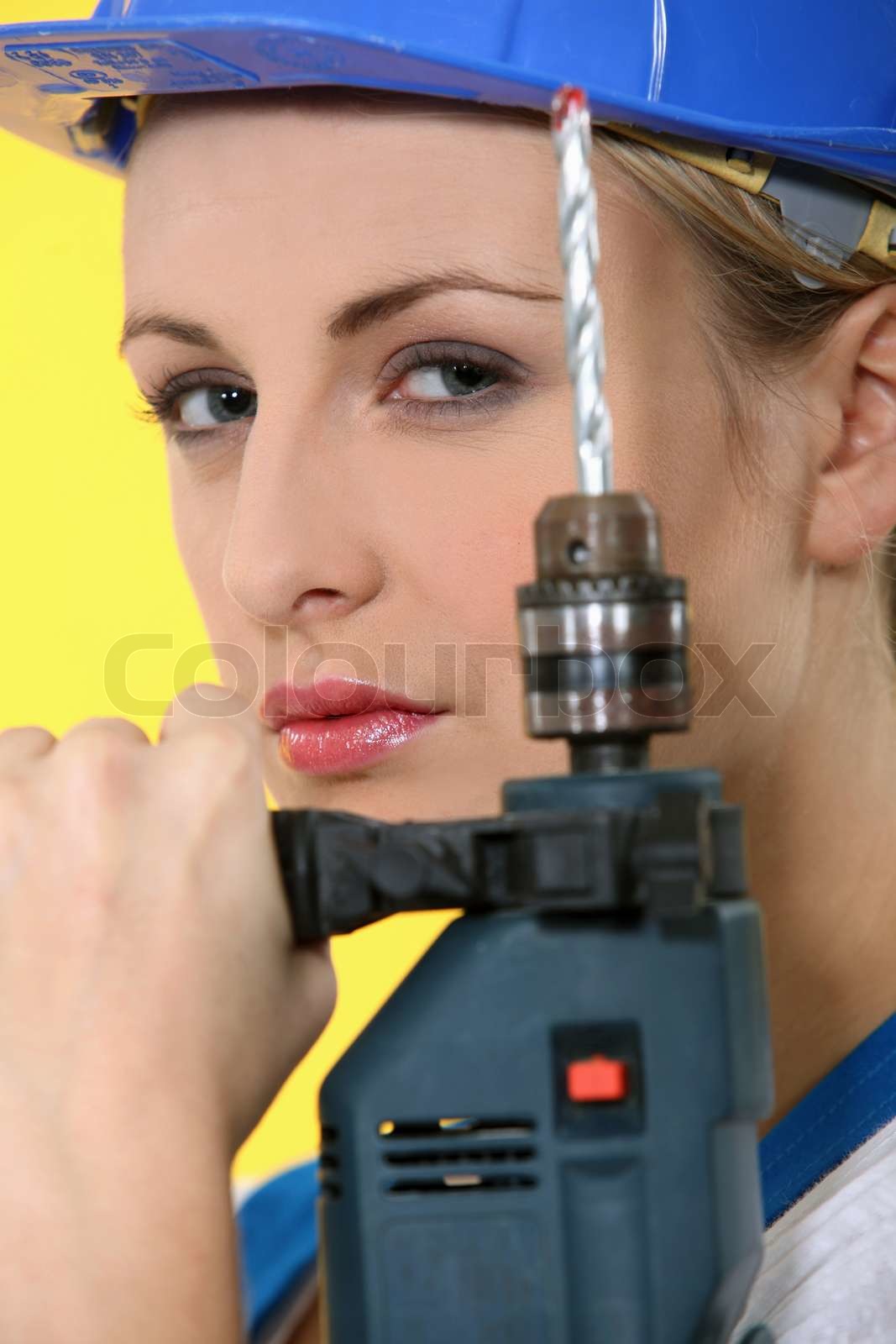 Nahaufnahme einer Frau mit Bohrer | Stock Bild | Colourbox