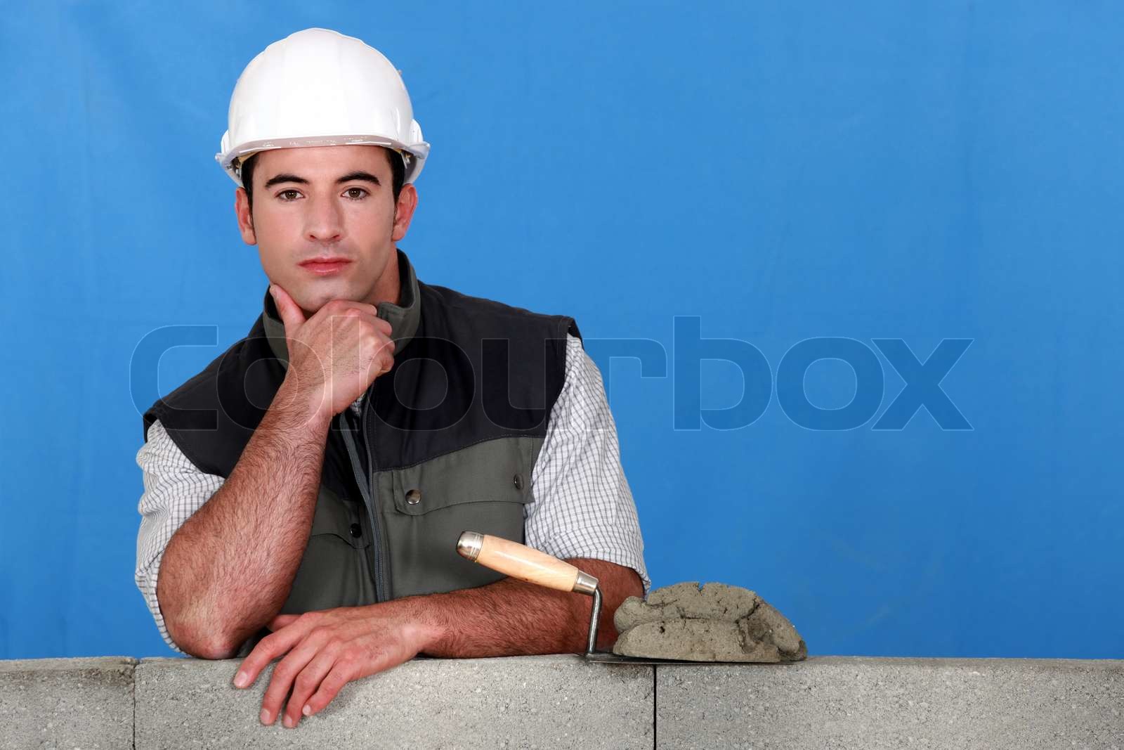 Man building wall | Stock image | Colourbox