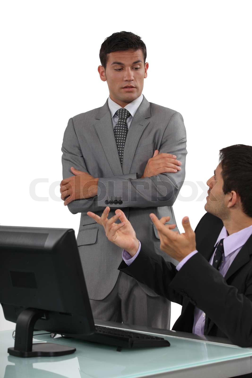 Boss having a discussion with his defensive employee | Stock image ...