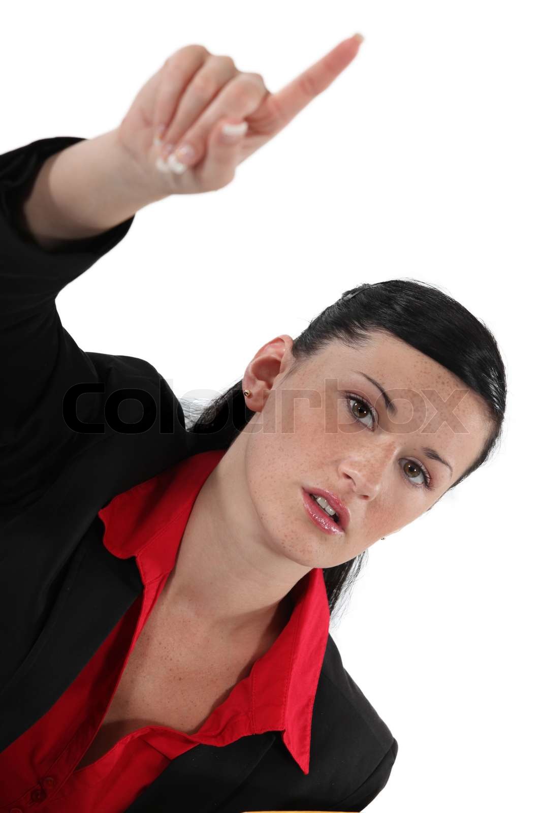 Geschäftsfrau, die ihre Hand heben | Stock Bild | Colourbox