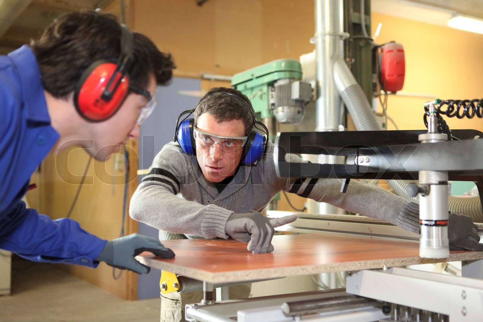 Craftsman and his apprentice | Stock image | Colourbox