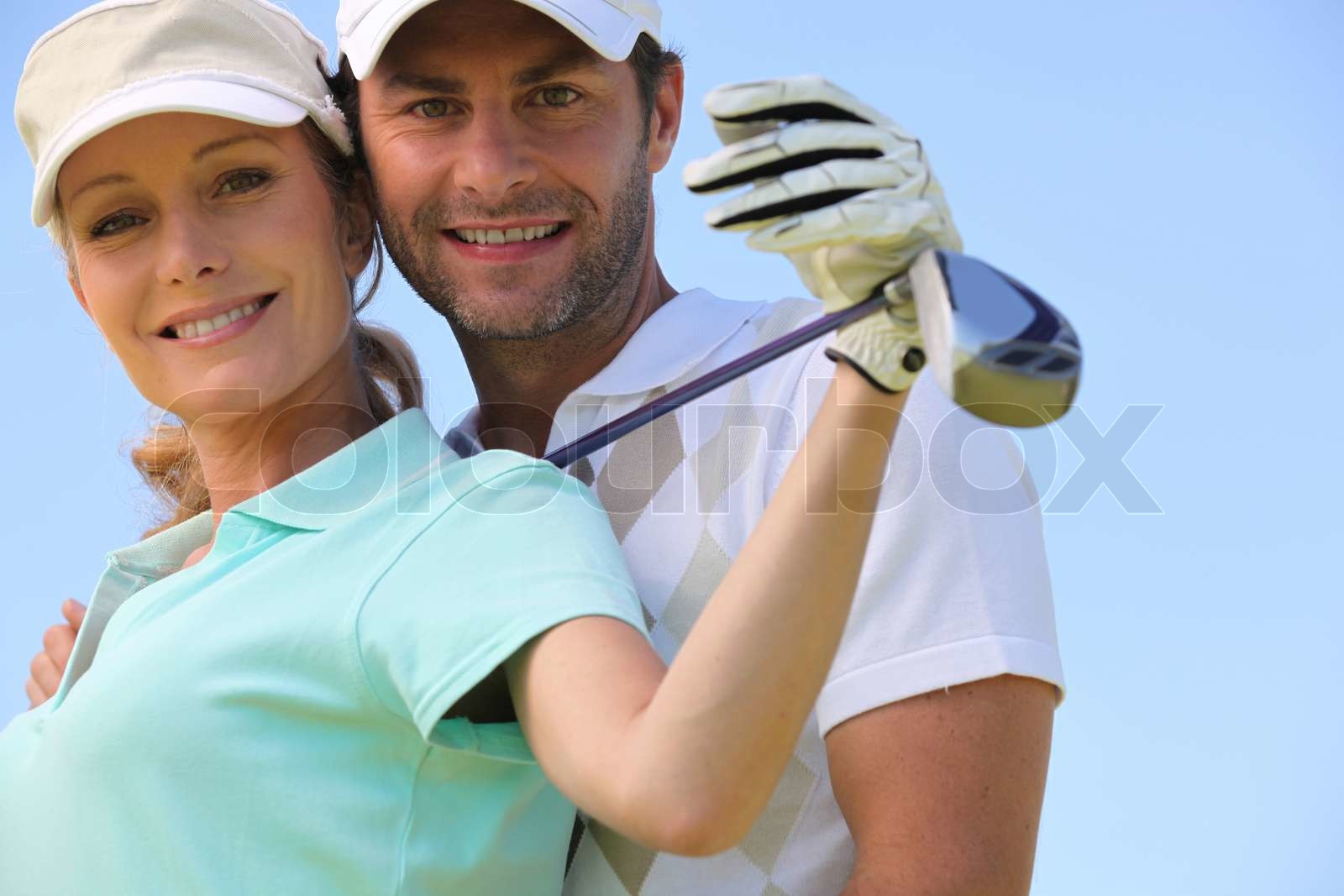 Golfing couple | Stock image | Colourbox