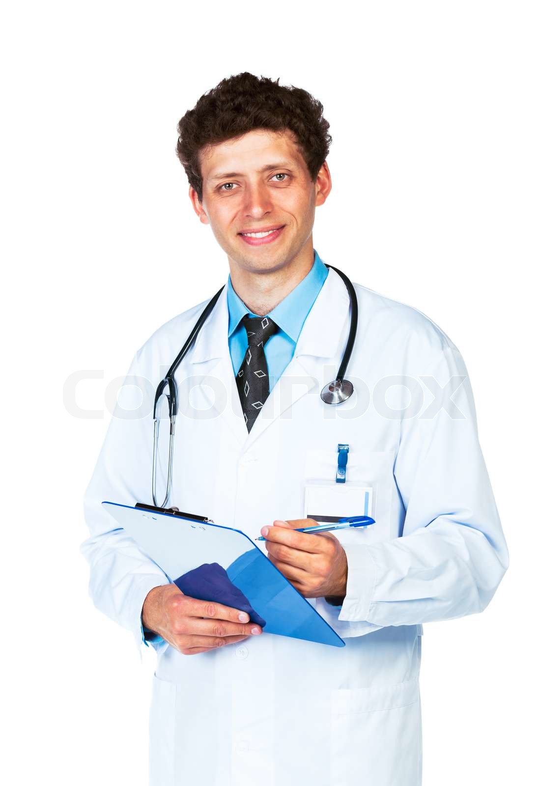 Portrait of smiling young male doctor writing on a patient's medical ...