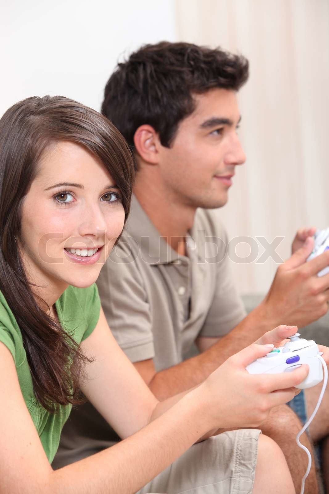 Teens playing computer games | Stock image | Colourbox