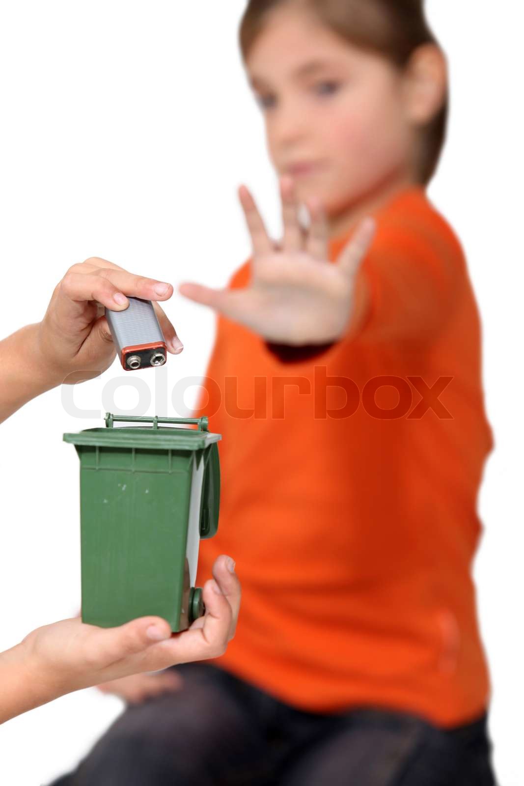 Kids illustrating improper disposal of batteries | Stock image | Colourbox