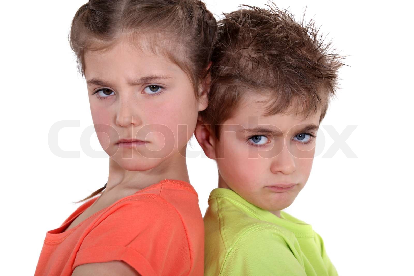 two angry kids posing together | Stock image | Colourbox