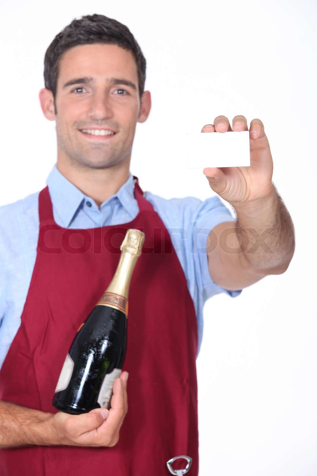 Waitor holding business card | Stock image | Colourbox